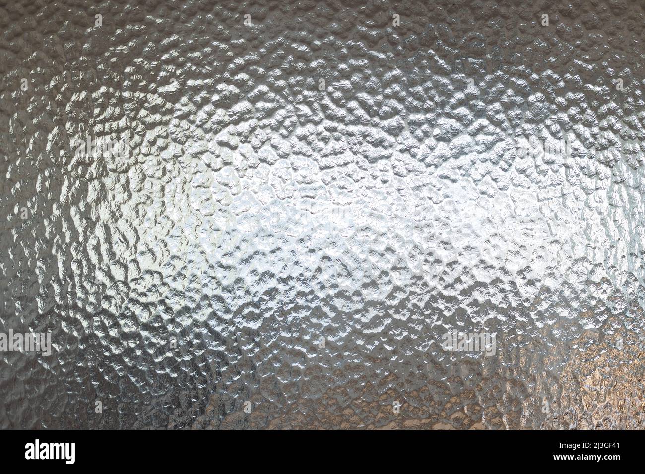 Filtering sunlight outside with opaque frosted glass Stock Photo - Alamy