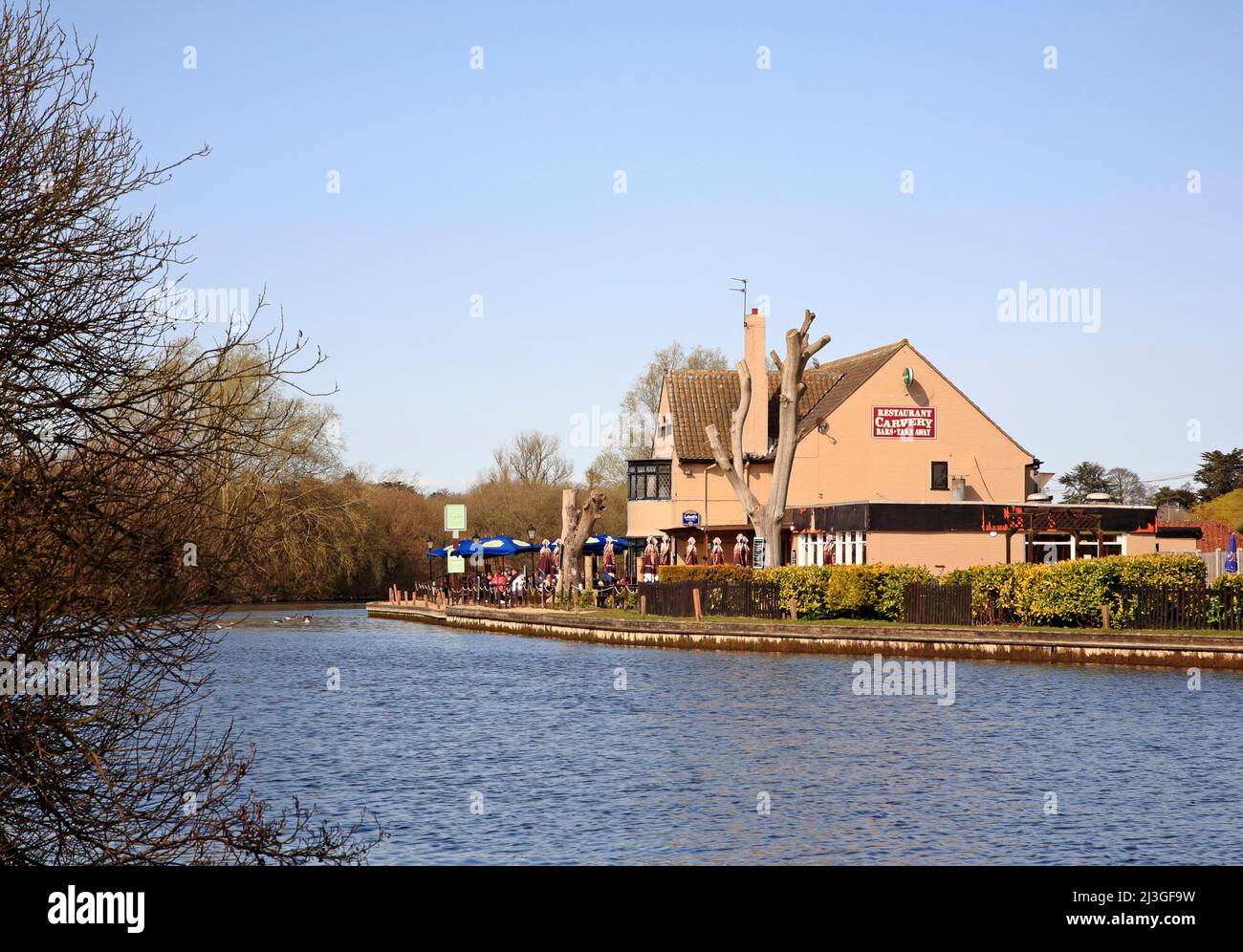 The Ferry Inn by the River Bure on the Norfolk Broads on an early ...