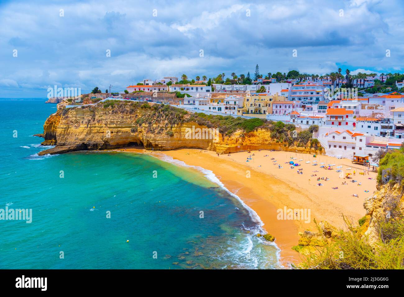 People are sunbathing on Praia de Carvoeiro beach in Portugal Stock ...