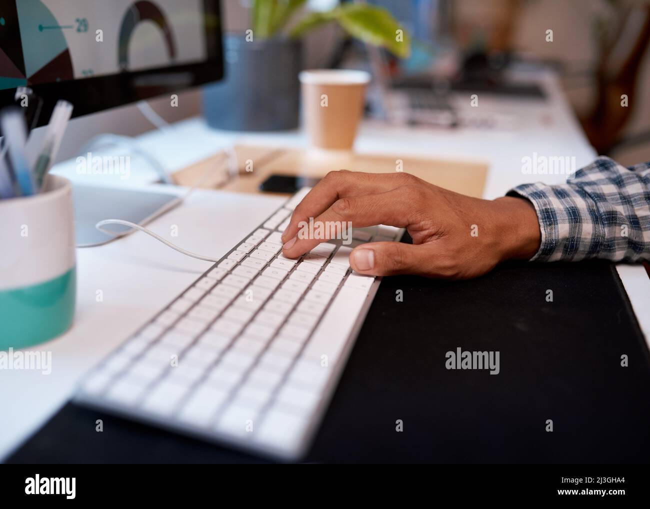 Close up of a man's hand typing on computer keyboard Stock Photo - Alamy