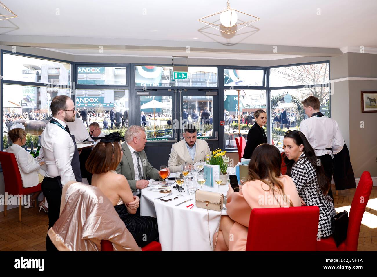 Guests enjoy themselves inside The Art School hospitality suite with ...