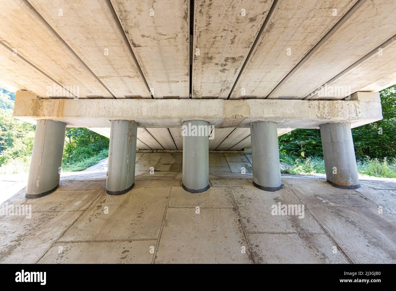Close-up of bridge piers, concreted slope under the bridge Stock Photo ...