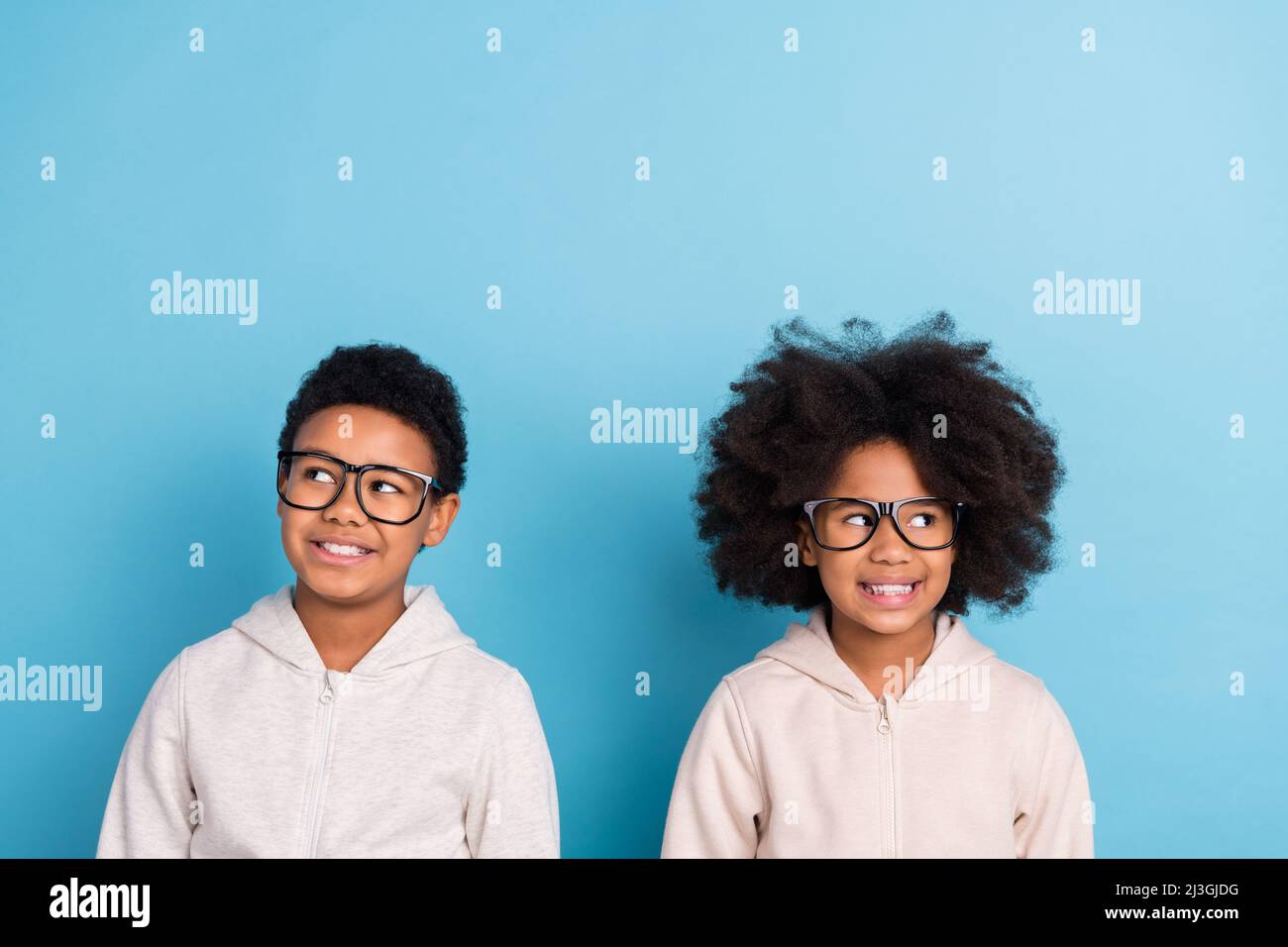 Portrait of attractive cheerful brainy friends friendship creating ...