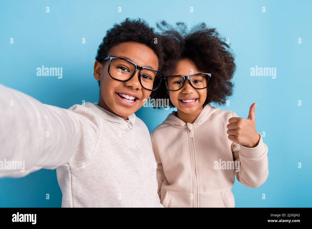 Self-portrait of small little friends friendship cheerful kids showing ...