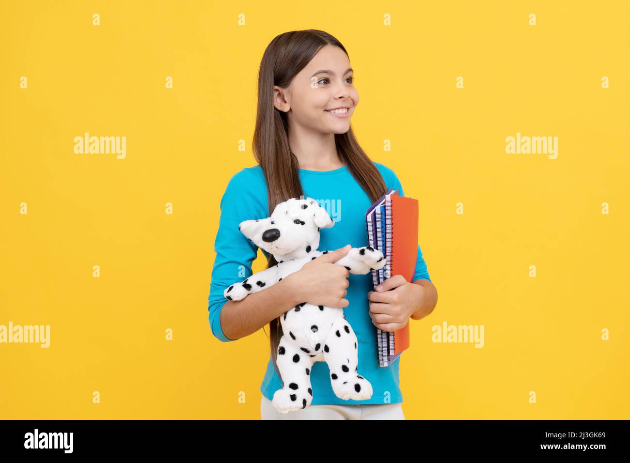 happy kid going to do homework with notepad. teenager student holding ...