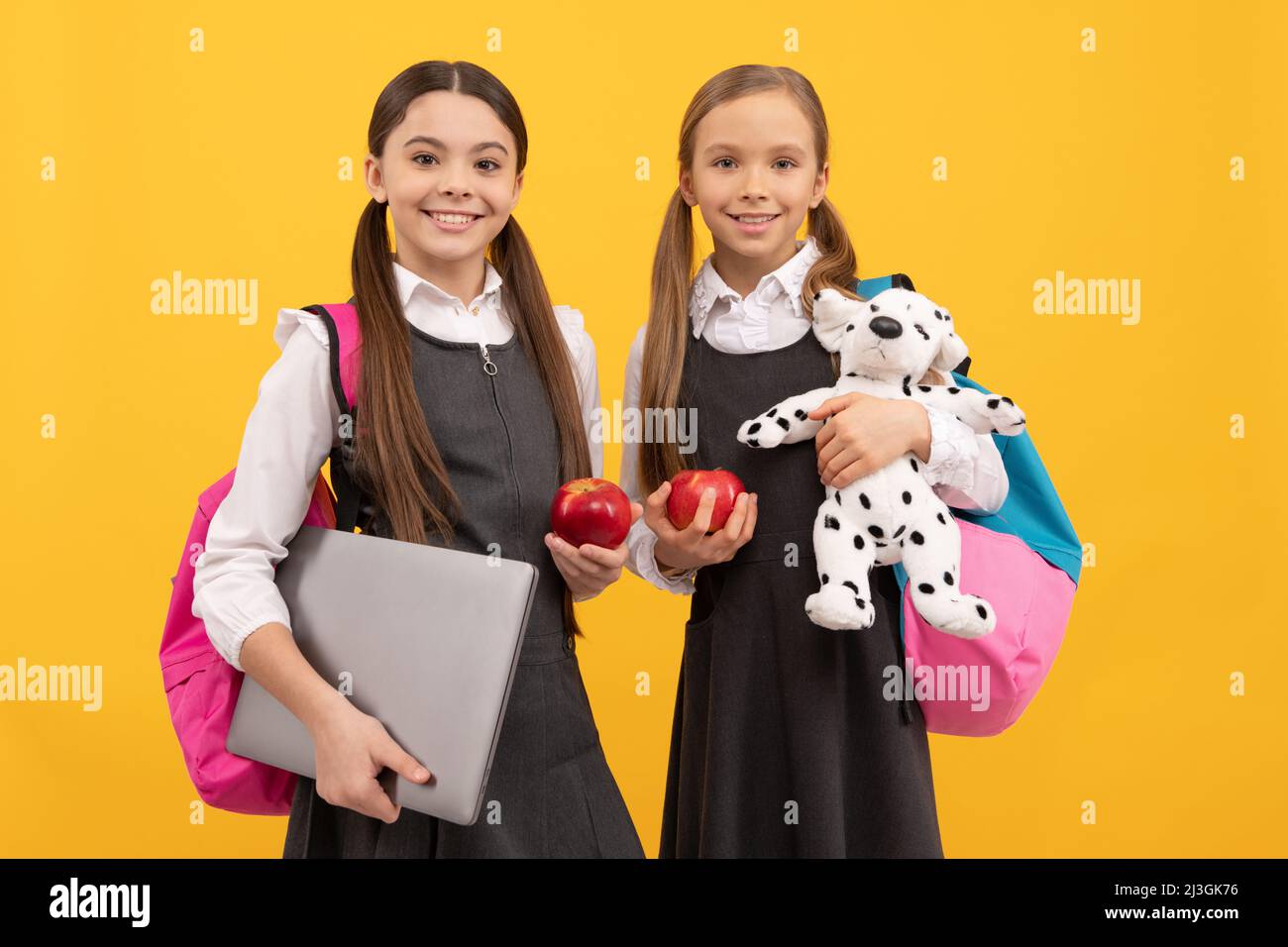 Fruit is always good. Hungry school kids yellow background. Snack break ...