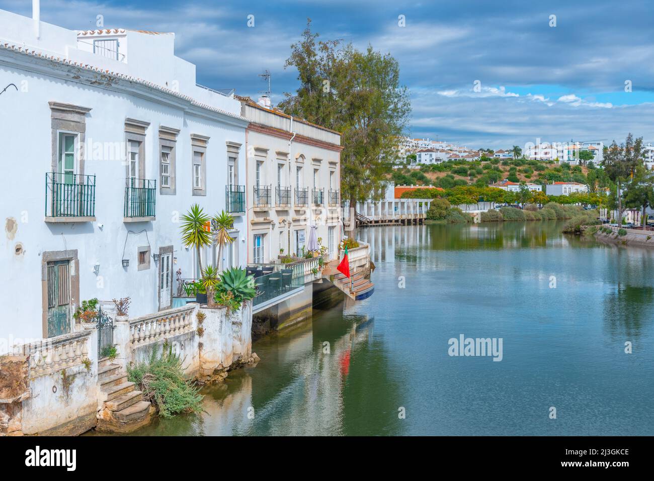 Houses on riverside of Gilao river in Tavira, Portugal Stock Photo - Alamy
