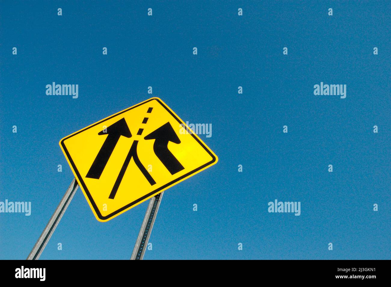 Sign of roadway showing new lane on the right of ongoing traffic Stock ...