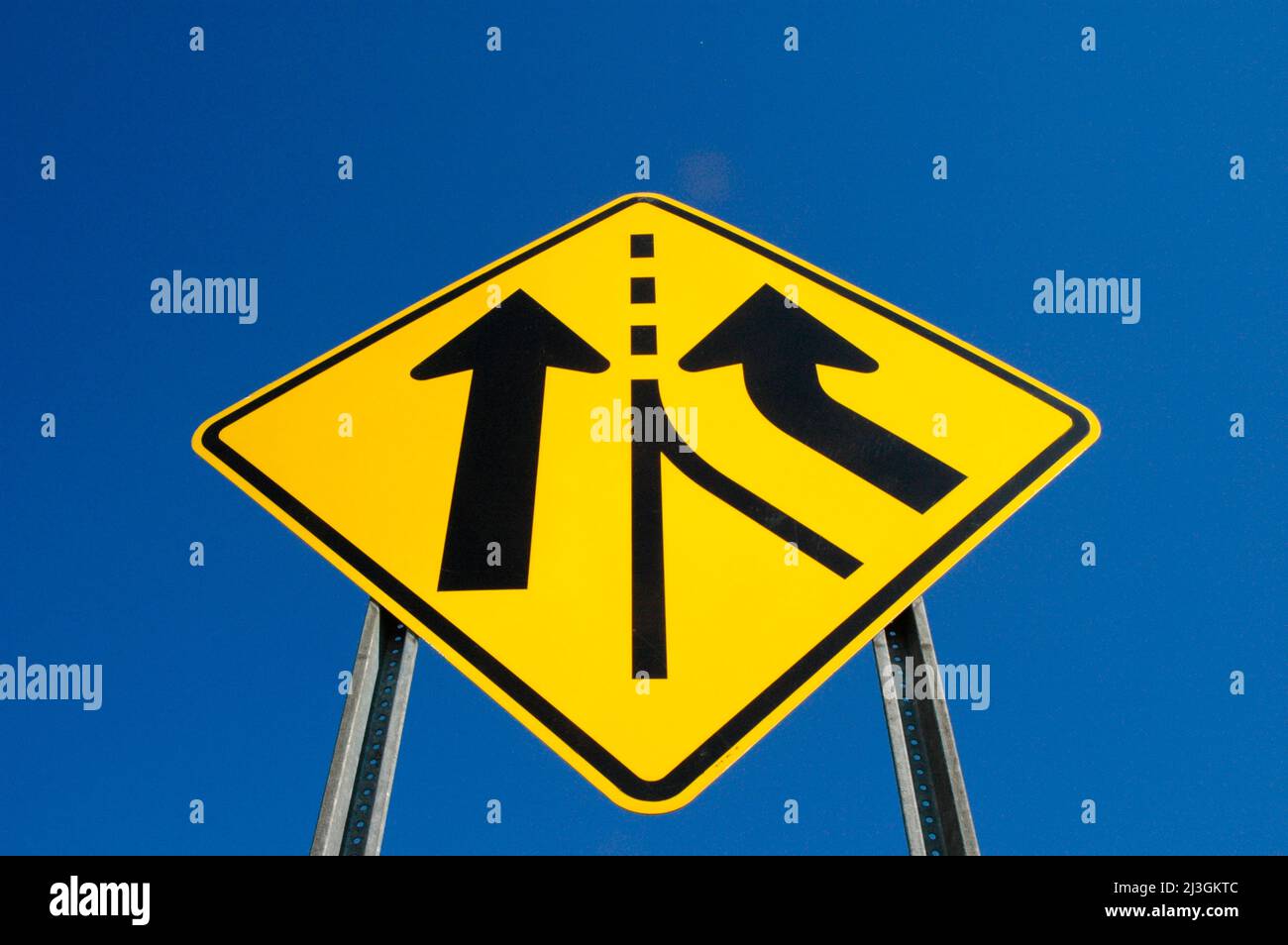Sign of roadway showing new lane on the right of ongoing traffic Stock ...