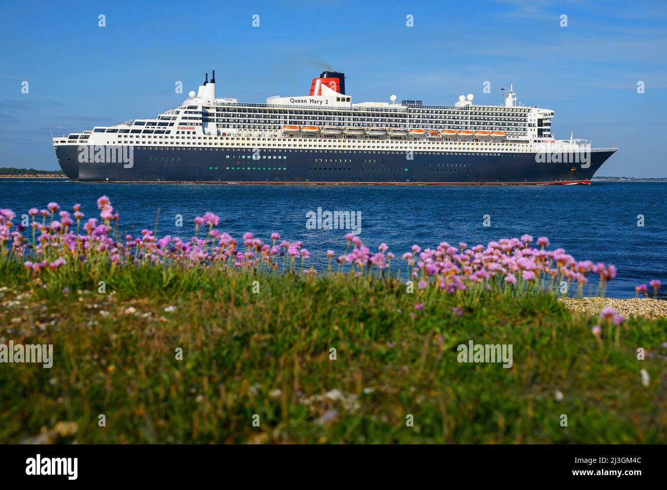 The Cunard ocean liner Queen Mary 2 outbound from her homeport of ...