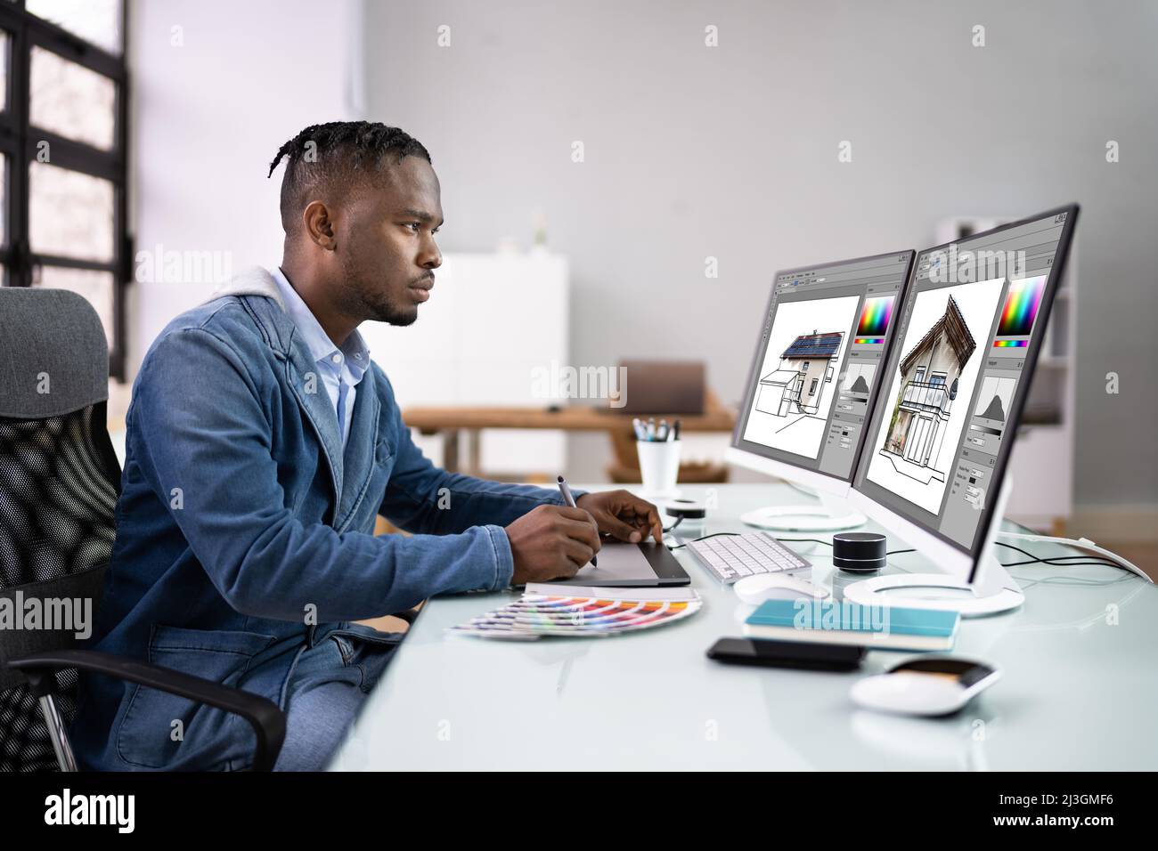 African Graphic Web Designer Using Design Editing Software Stock Photo ...