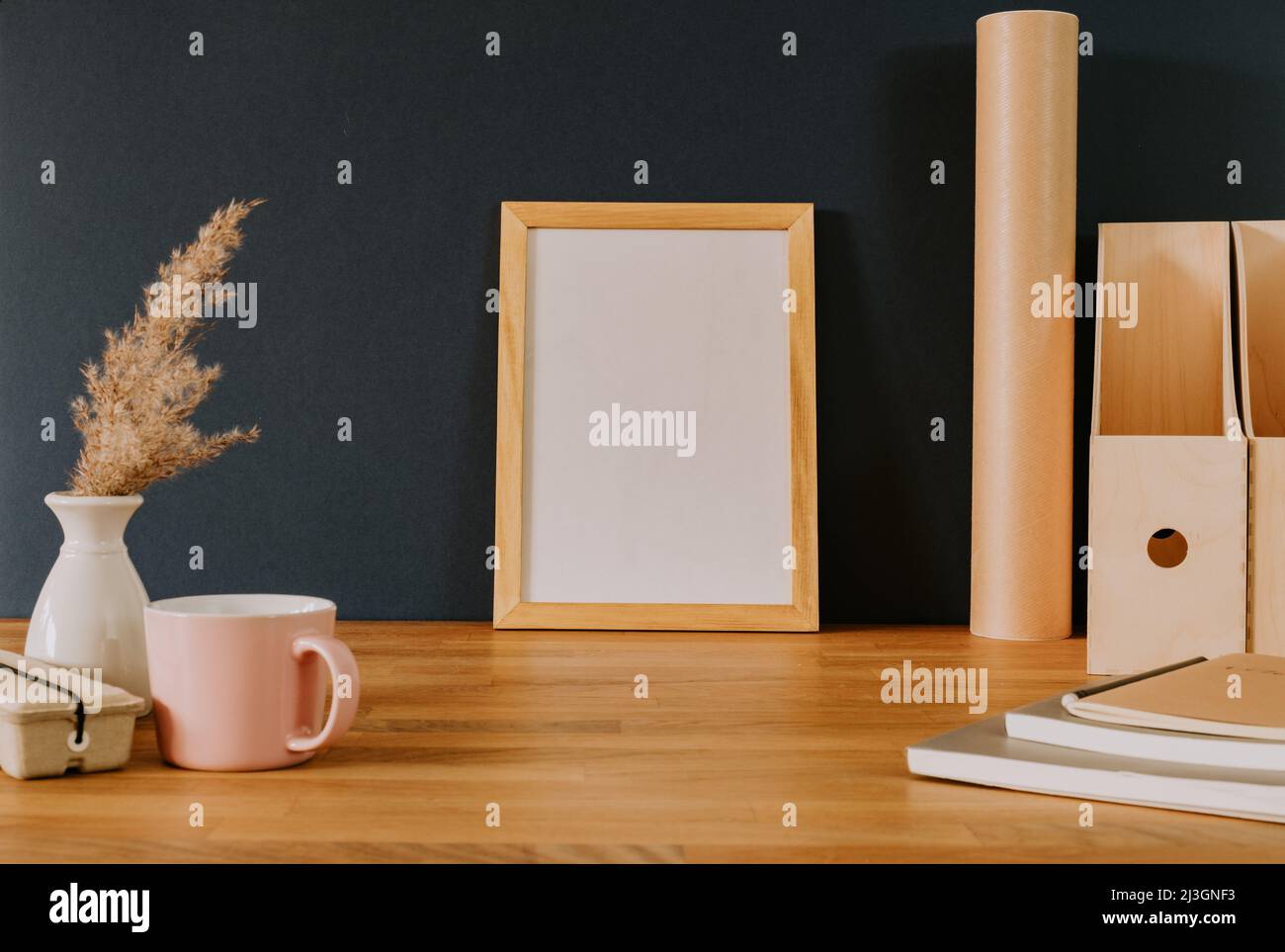 Your text here - empty frame on wooden table Stock Photo - Alamy
