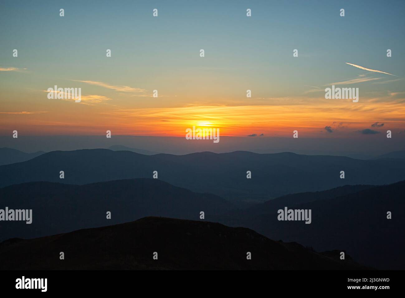Orange sunset in the Polish mountains Bieszczady Stock Photo - Alamy
