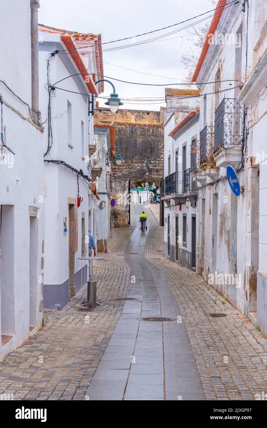 Narrow street in Portuguese town Serpa Stock Photo - Alamy
