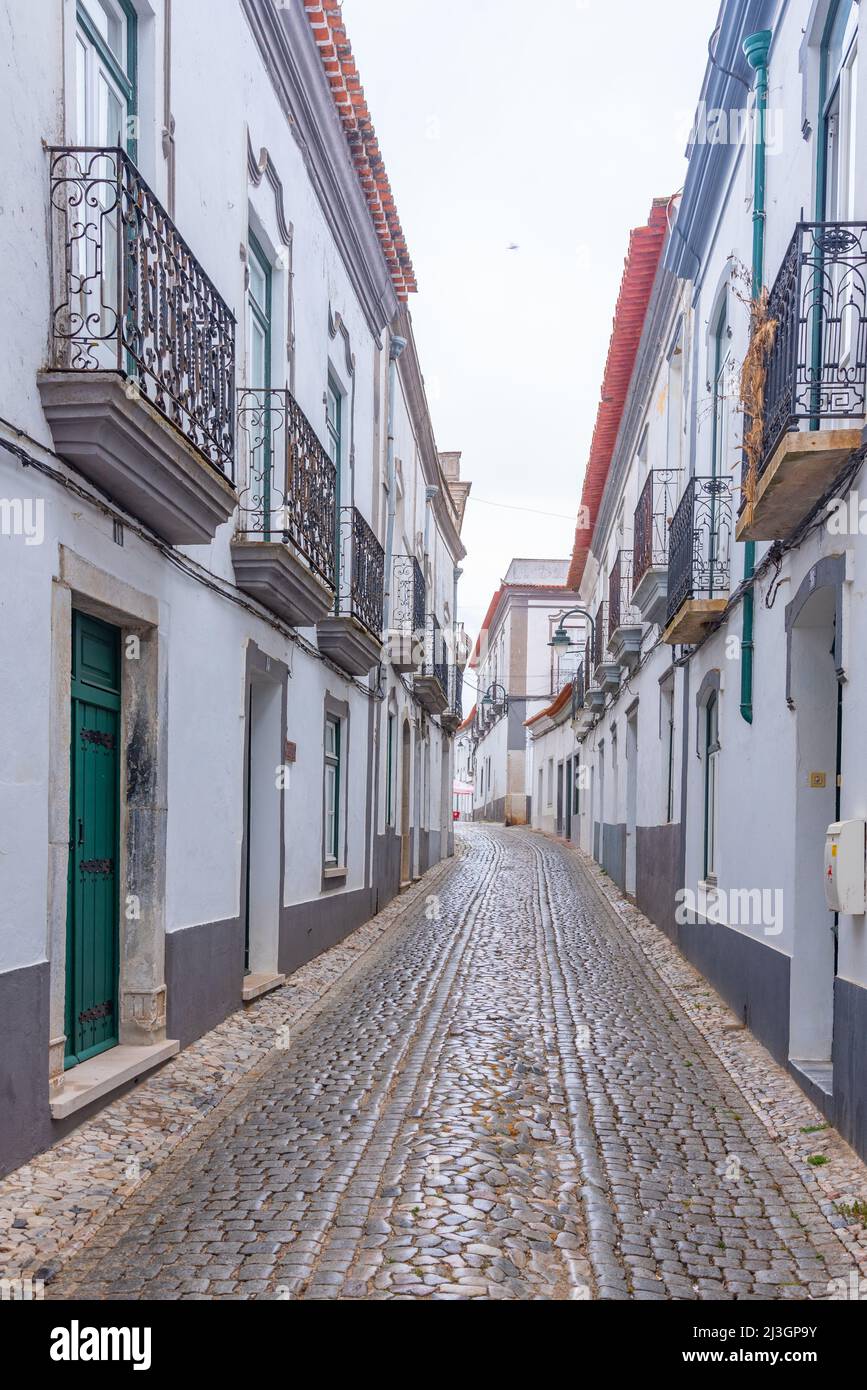 Narrow street in Portuguese town Serpa Stock Photo - Alamy