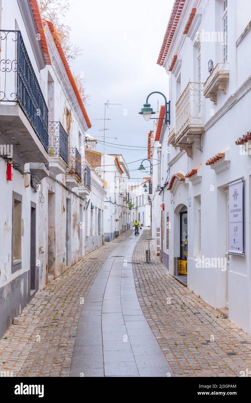 Narrow street in Portuguese town Serpa Stock Photo - Alamy