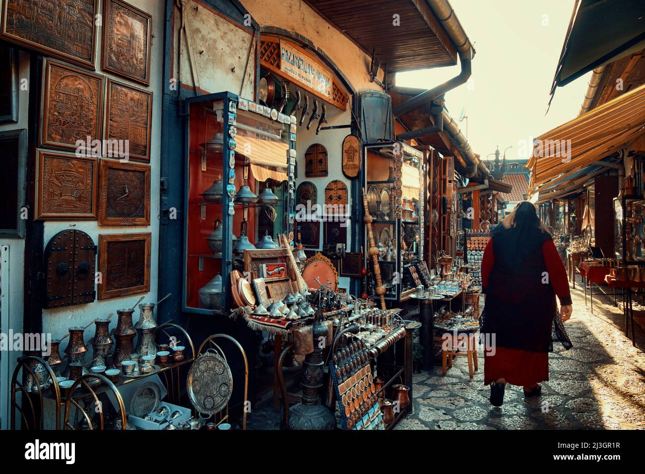 SARAJEVO, BOSNIA AND HERZEGOVINA - JULY 14, 2018: muslim woman walking ...