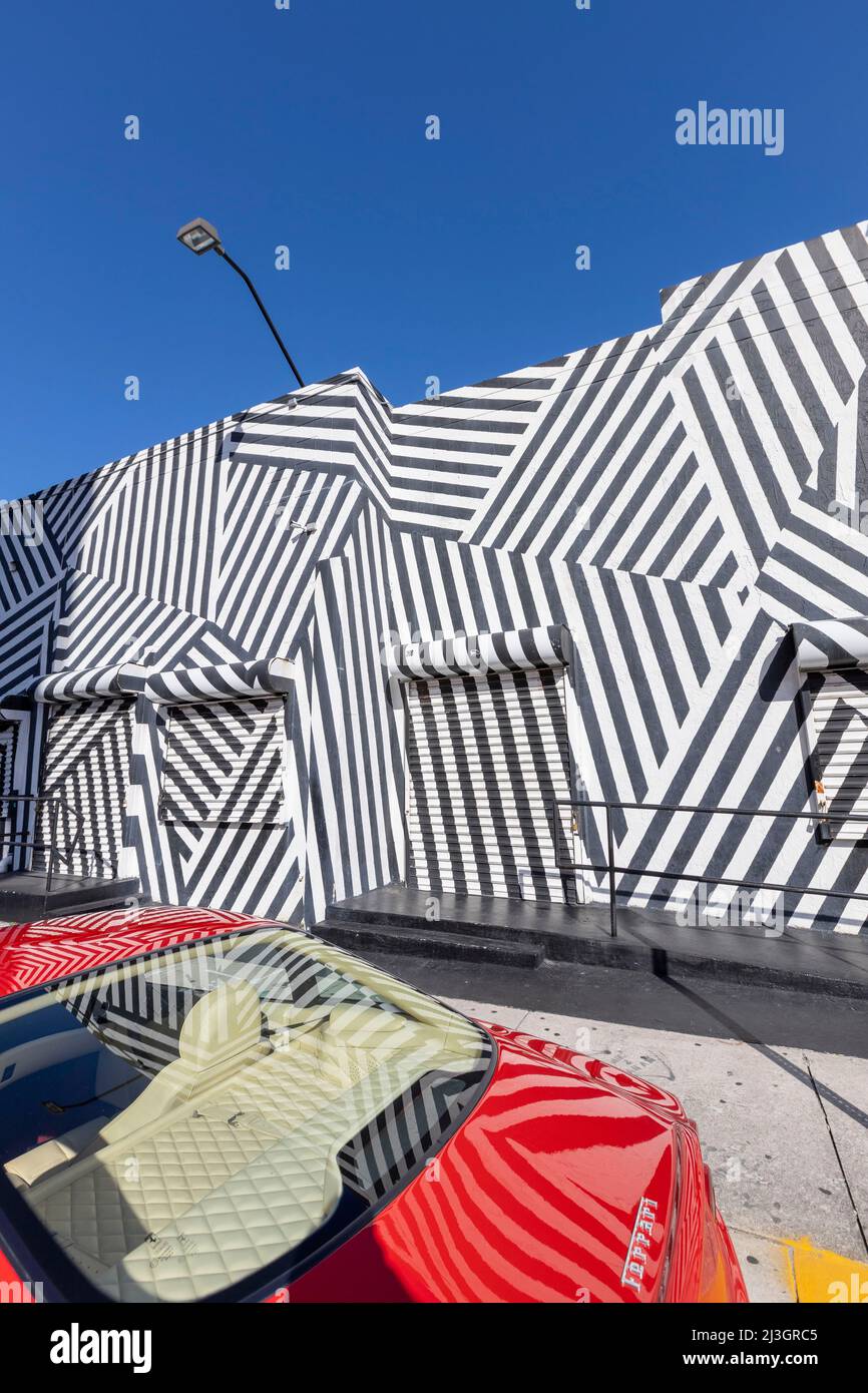 United States, Florida, Miami, Reflection of stripes in a red Ferrari ...