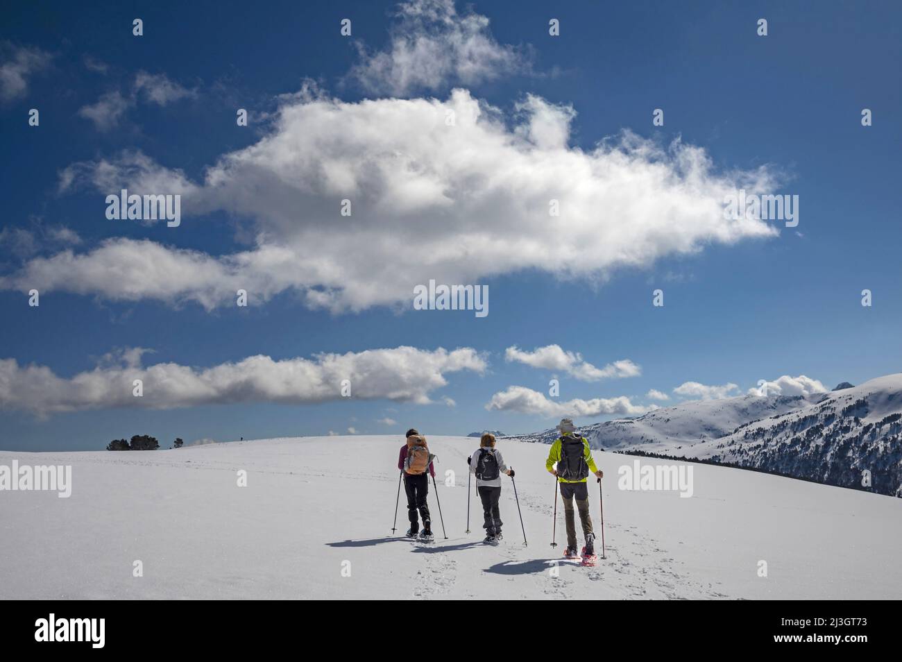 France, Ariege, Pyrenees massif; Les Cabannes, snowshoeing on the ...