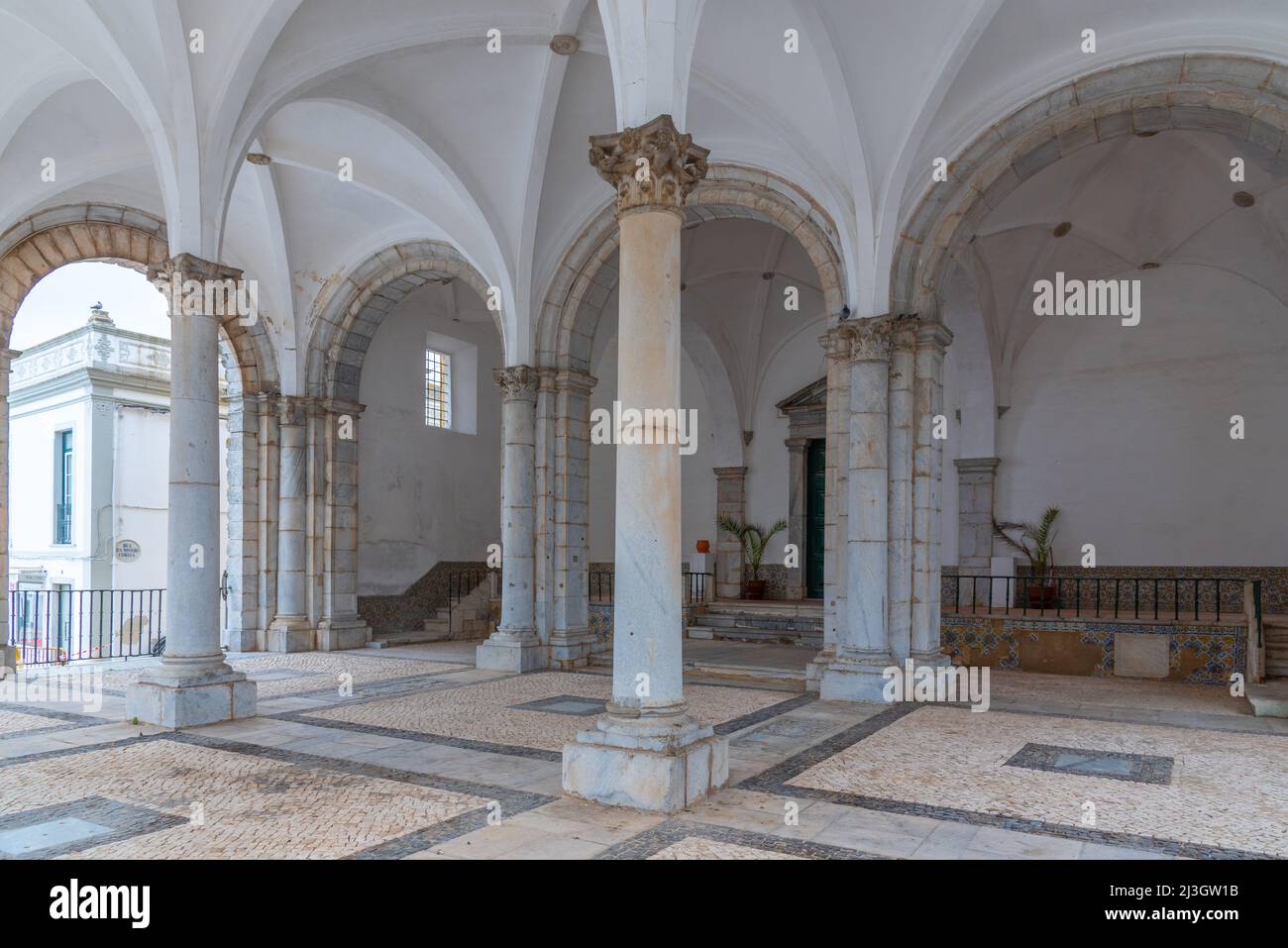 White portico in Portuguese town Beja Stock Photo - Alamy