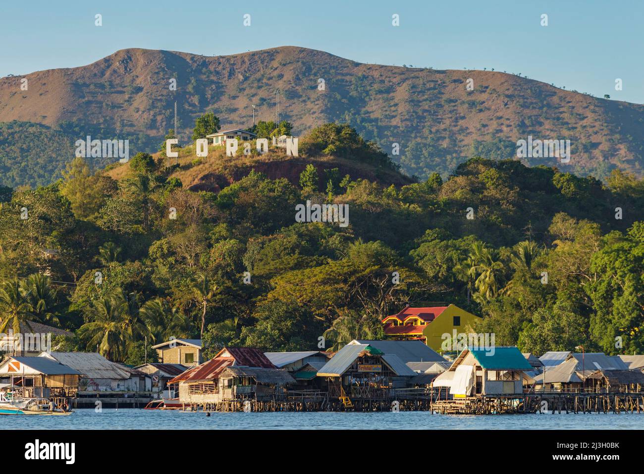 Philippines, Palawan, Calamianes Archipelago, Coron town, a giant sign ...