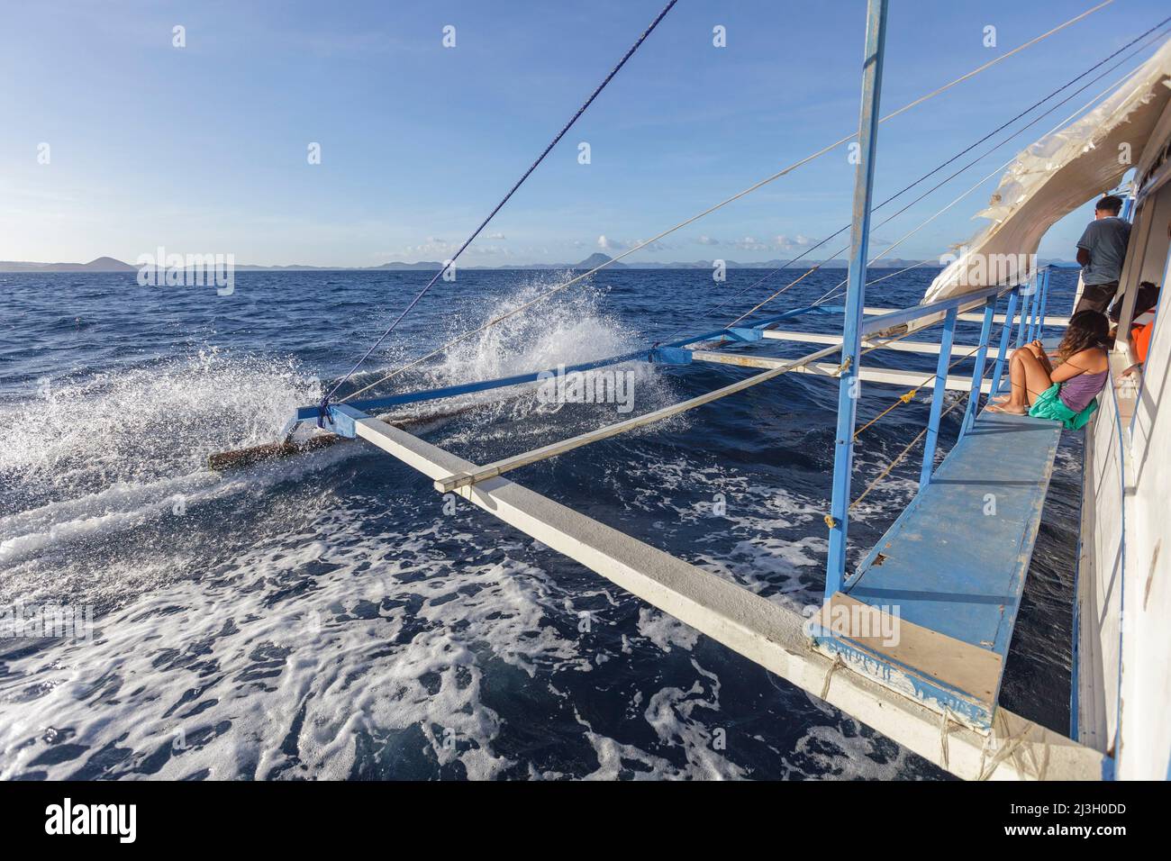 Philippines, Palawan, Calamianes archipelago, waves hit the outriggers ...
