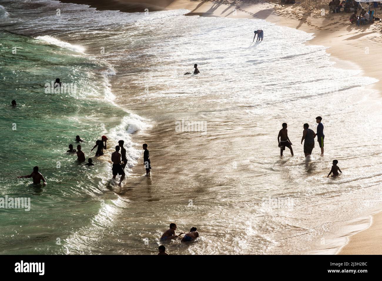 Large group of people on Paciencia beach in the Rio Vermelho ...