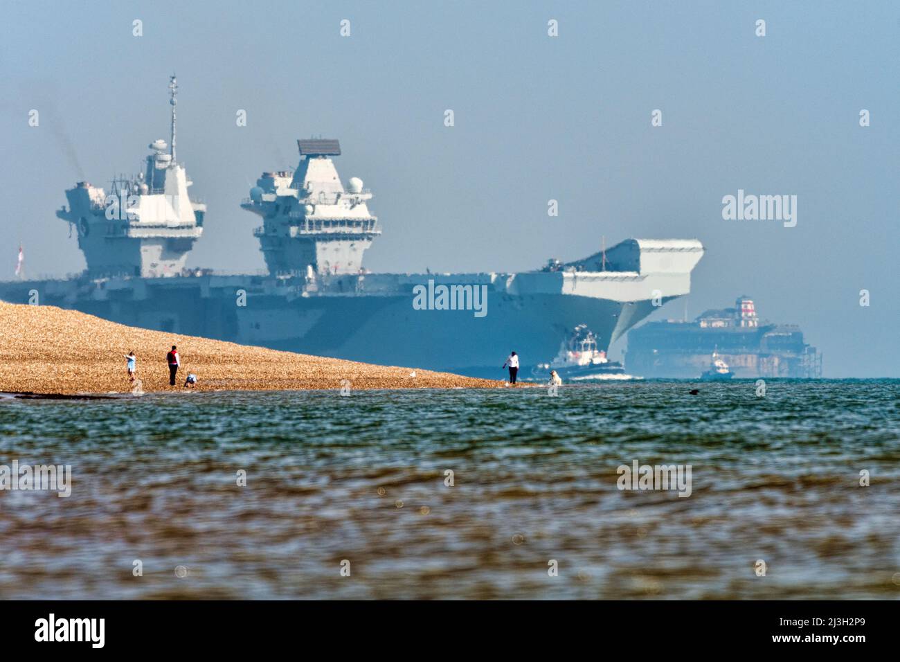 The Royal Navy aircraft carrier HMS Queen Elizabeth (R08) entering the ...