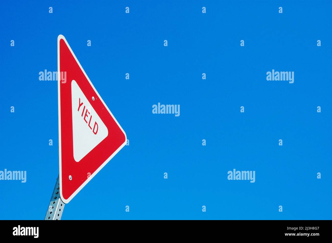 Yield sign for drivers to heed as they move on freeways and highways ...