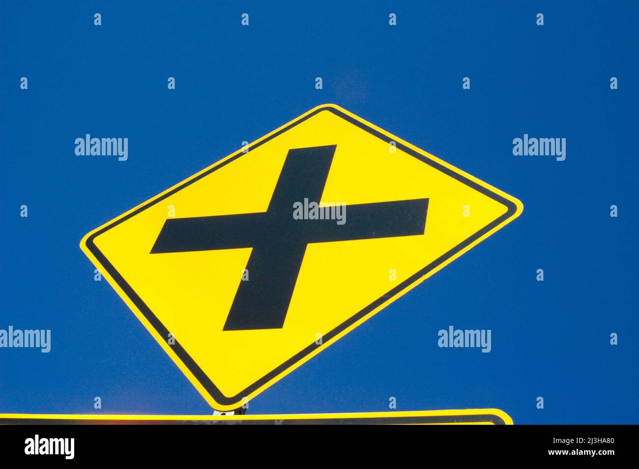 cross roads ahead signs for drivers to see on freeway and roads and ...