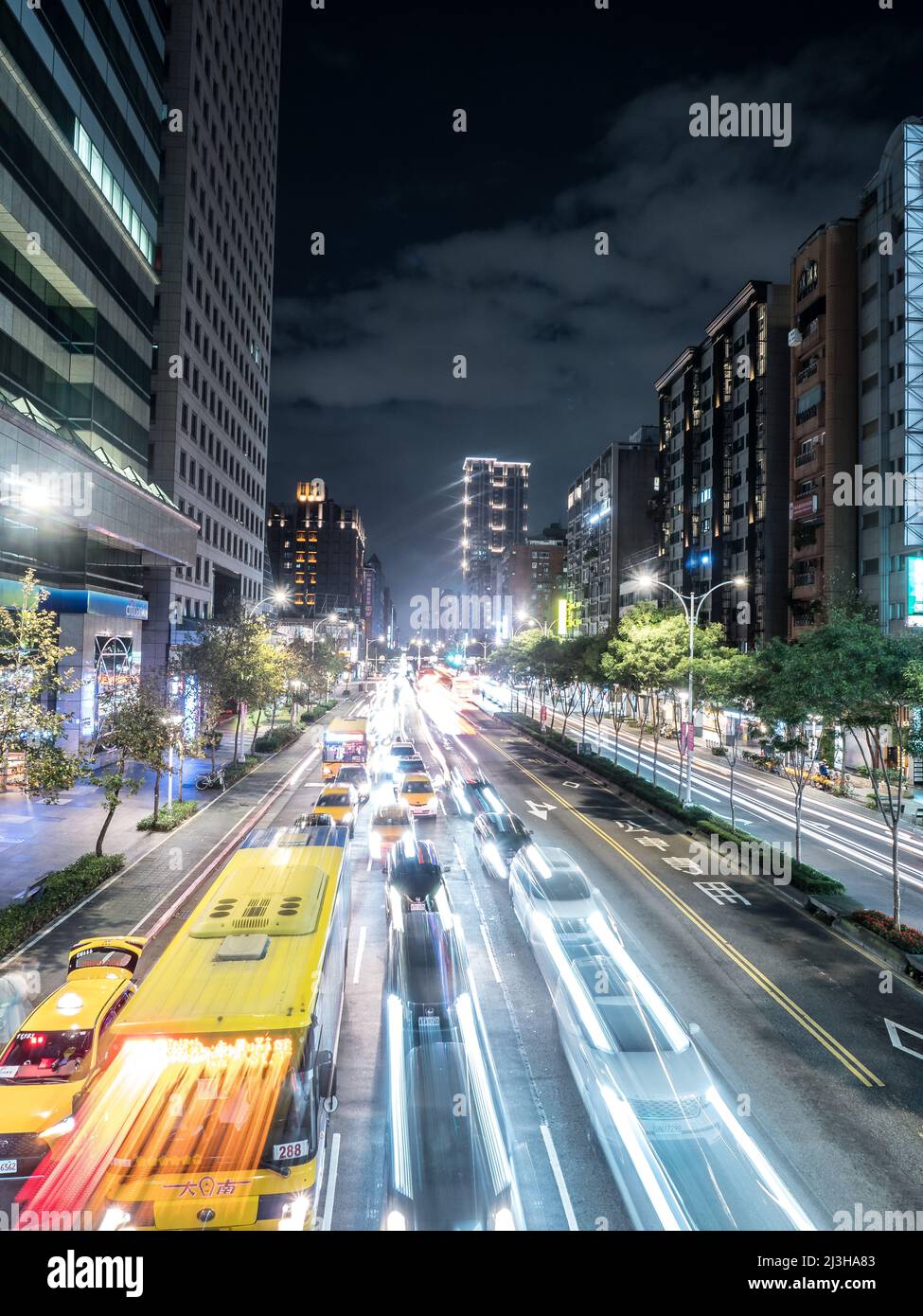 Long exposure of busy street in downtown Taipei Stock Photo - Alamy
