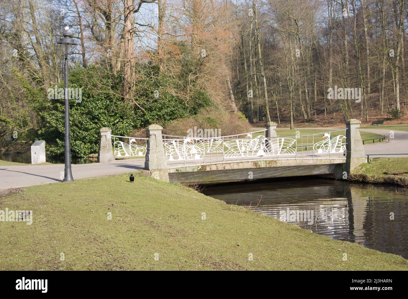 Small bridge over a brook in Sonsbeek park in Arnhem in the Netherlands ...