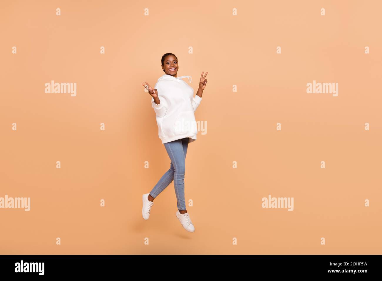 Full size portrait of attractive cheerful lady two hands make v-sign ...