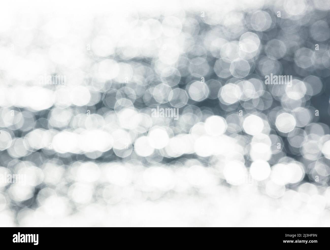 Bokeh light effects on blurred water Stock Photo - Alamy