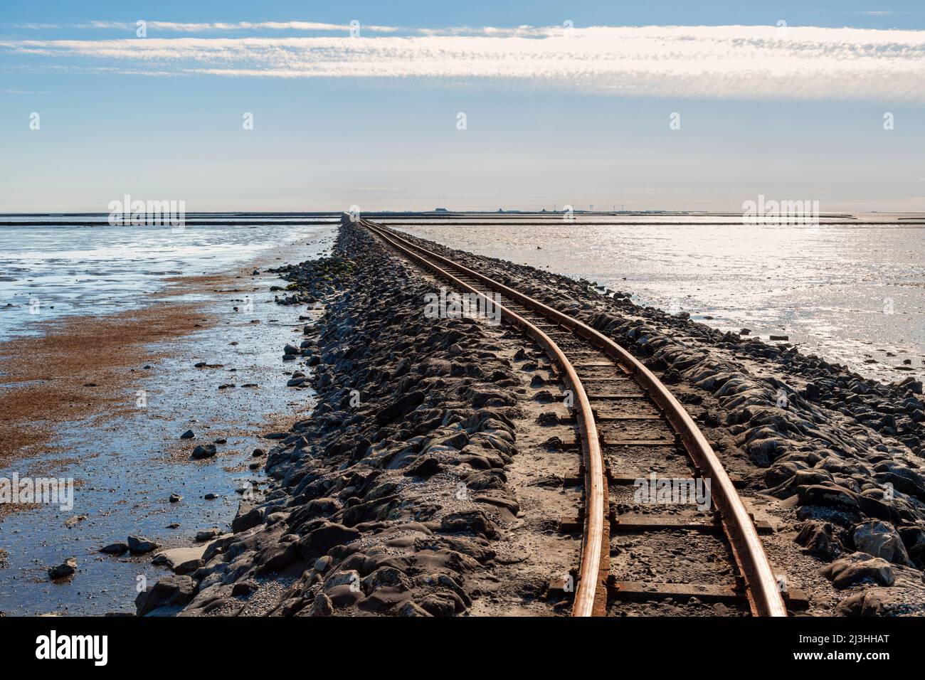 Railroad tracks on the North Sea from mainland to island Stock Photo ...