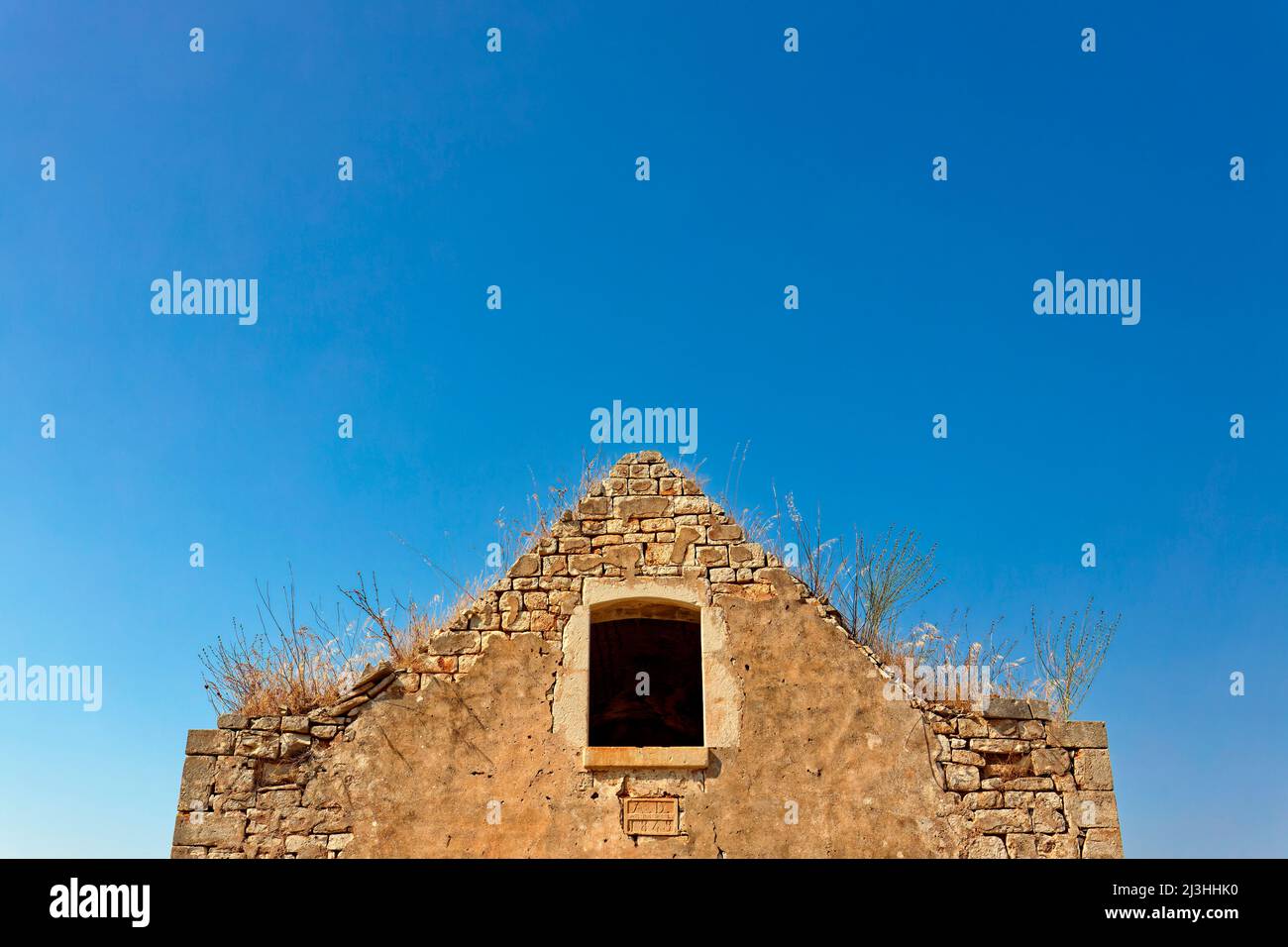 Roof gable of collapsed building in Italy, Apulia Stock Photo - Alamy