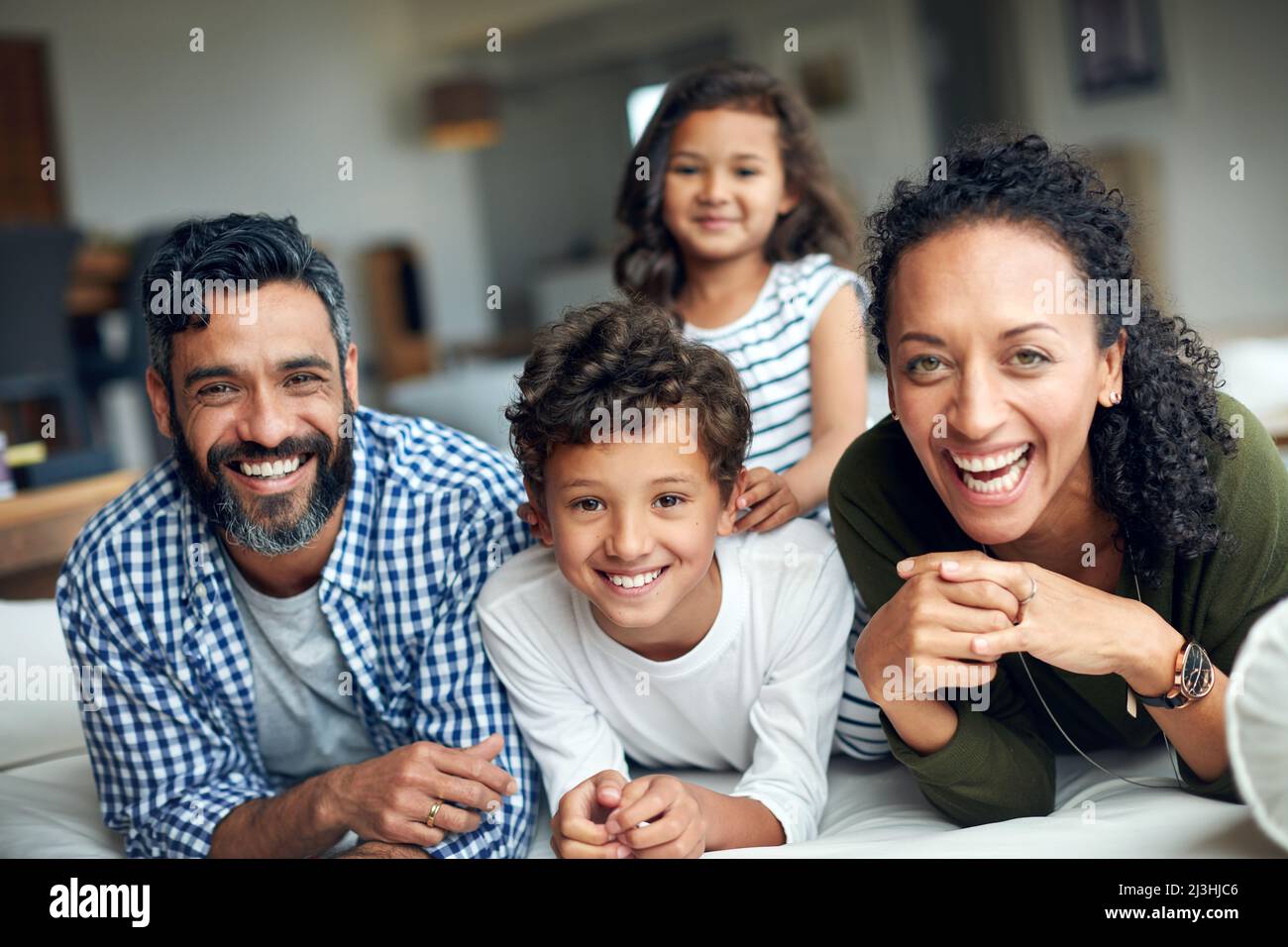 Quality time strengthens their family bond. Portrait of a happy family ...