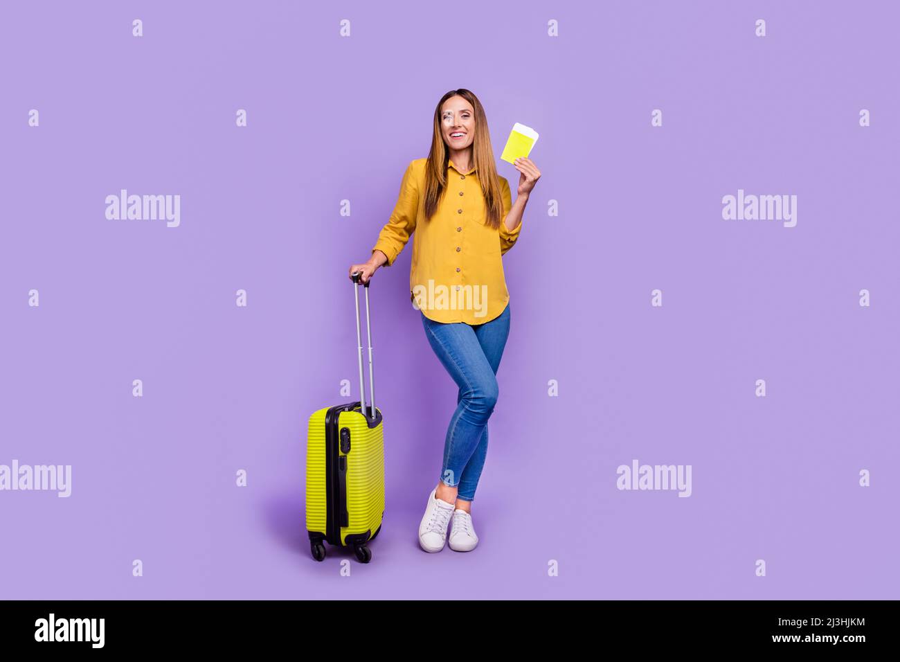 Full length image of lovely girl in airport waiting for her flight hold ...