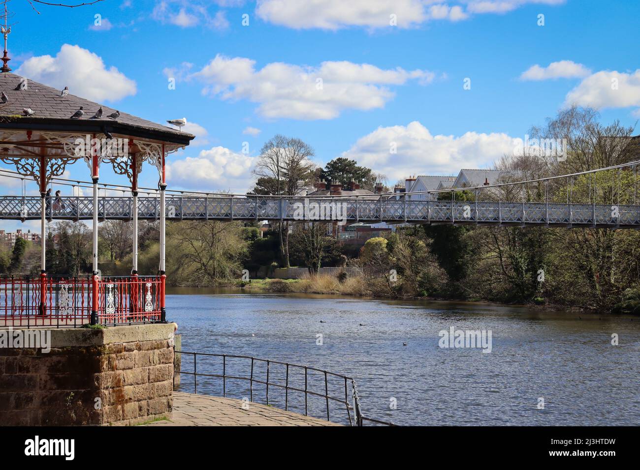 View of the bandstand and suspension bridge from The Groves, River Dee ...