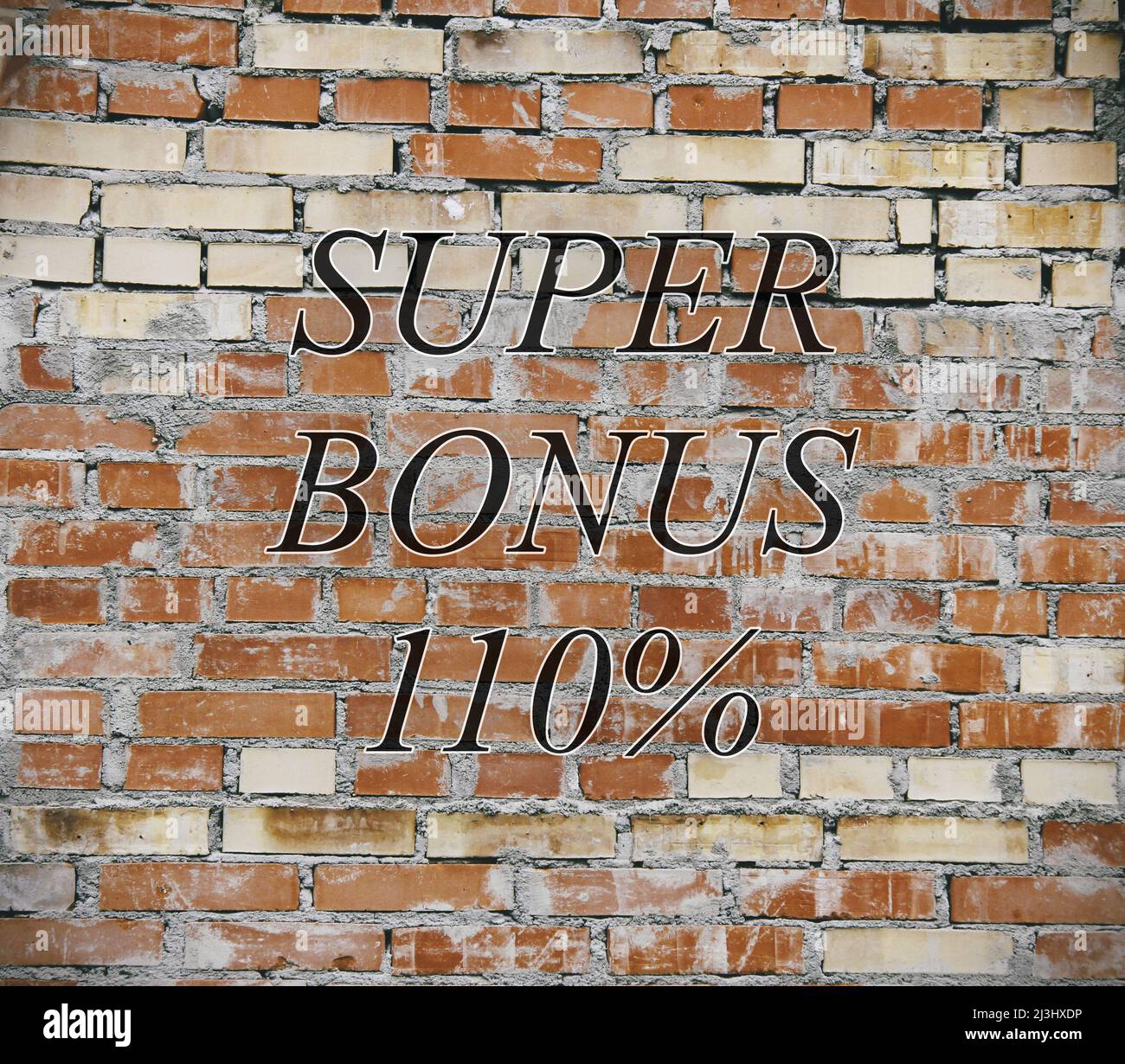 Text "Super bonus 110%" with bricks as background Stock Photo - Alamy
