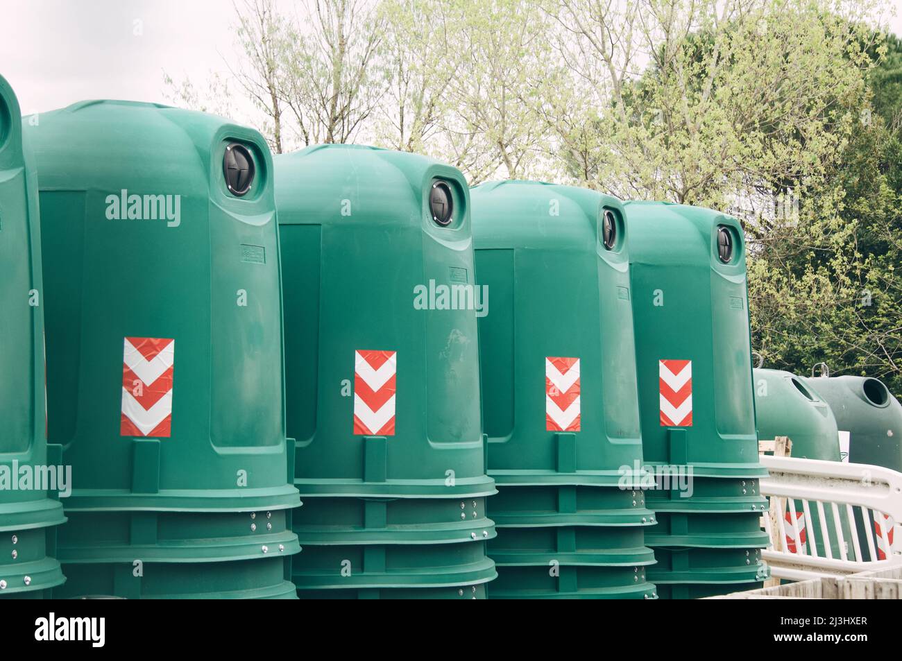 Brand new Garbage bins in a row used for recycling waste in the city ...