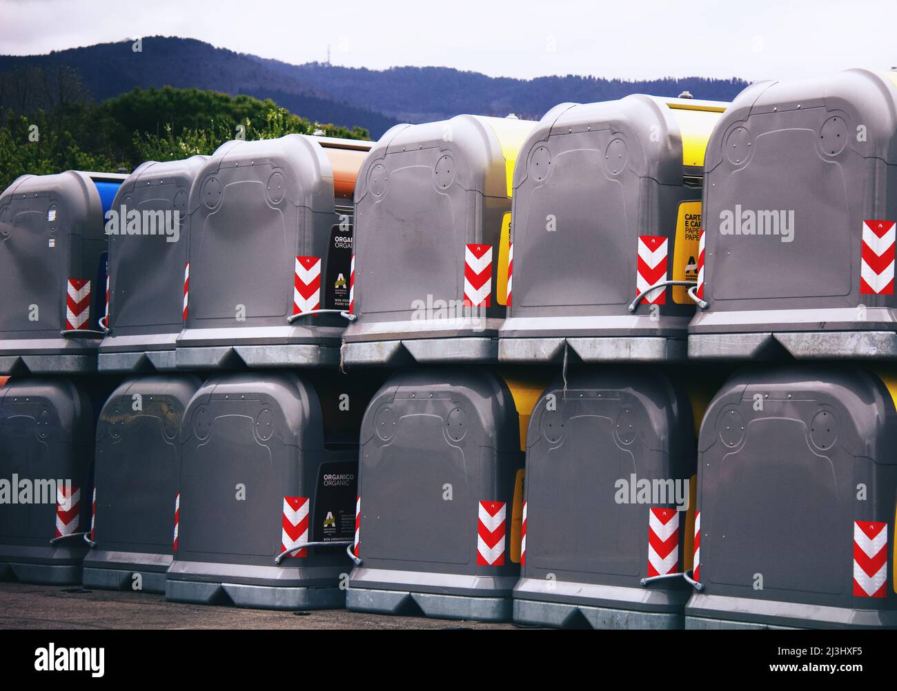 Shot of brand new trash bins in a row, ready to be place in the city ...