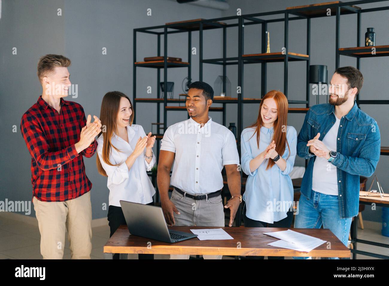 Front view of successfulmultiethnic business team of young startup ...