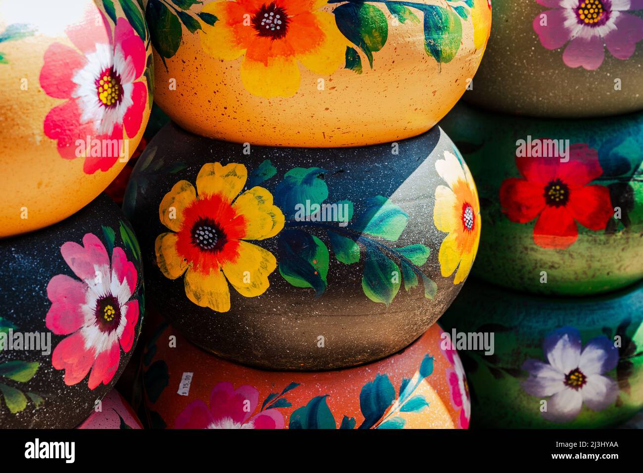 Variety of Colorfully Mexican Painted Ceramic Pots in an Outdoor ...