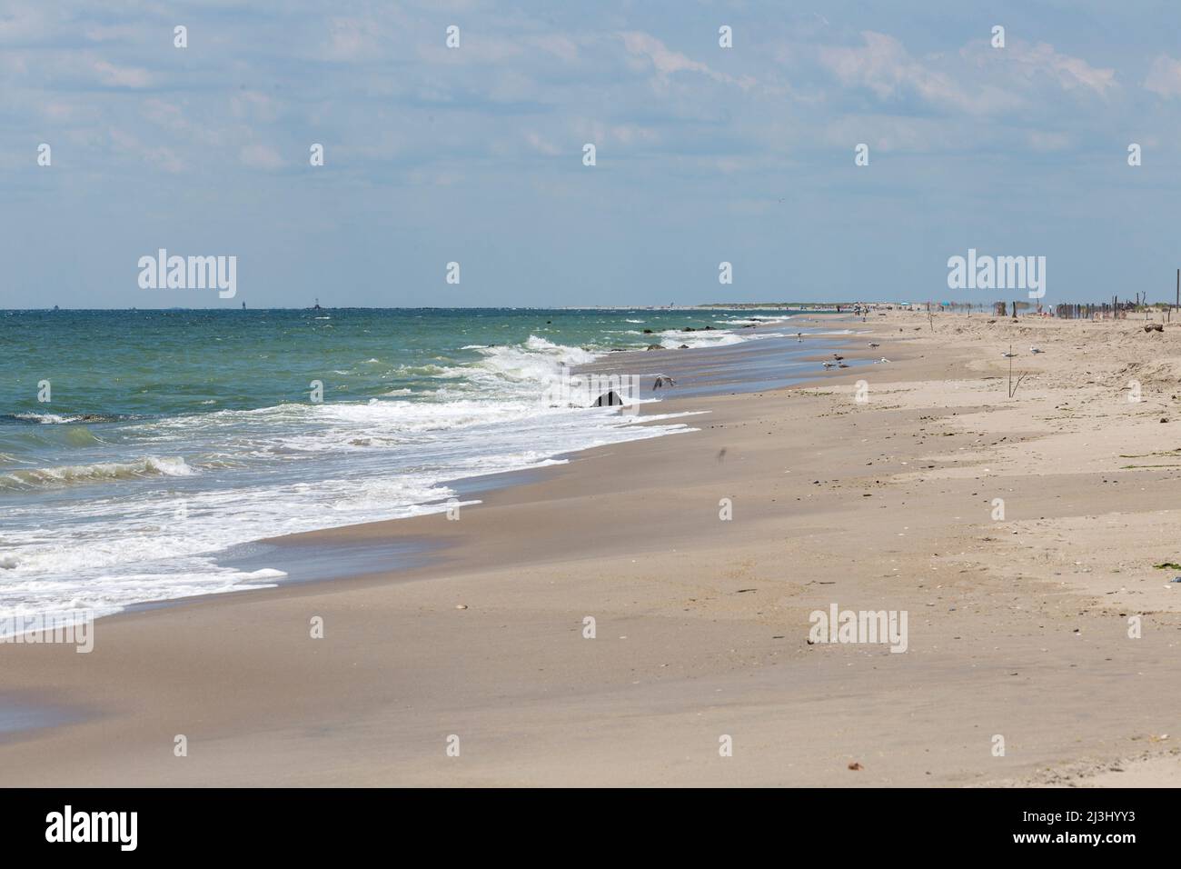 Breezy Point, New York City, NY, USA, The ocean rolling on the beach ...