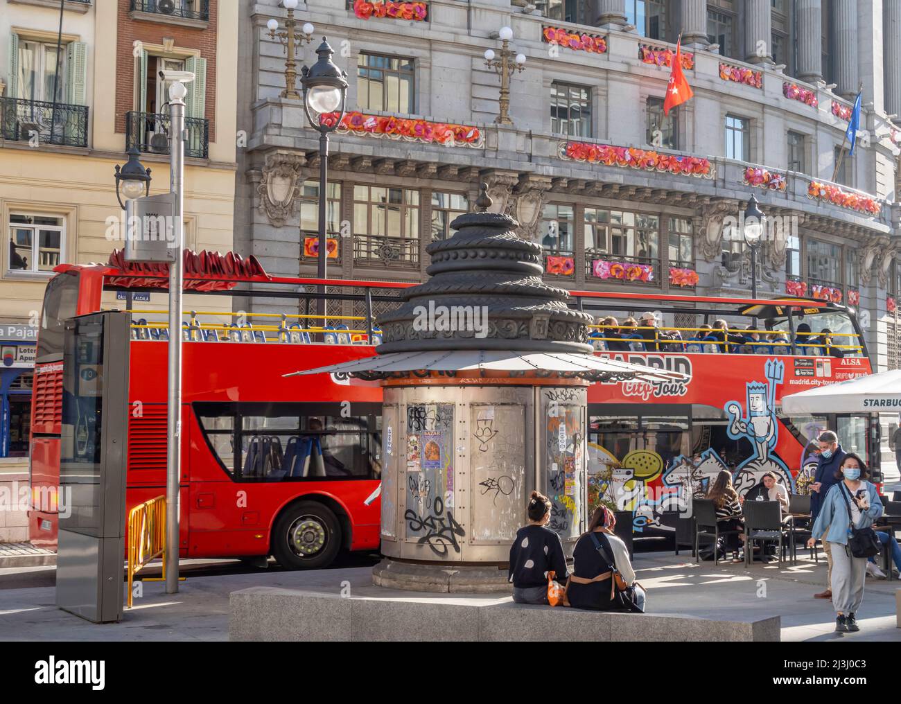 Red Madrid City tour bus on Gran Via. Tourist transportation buses in ...