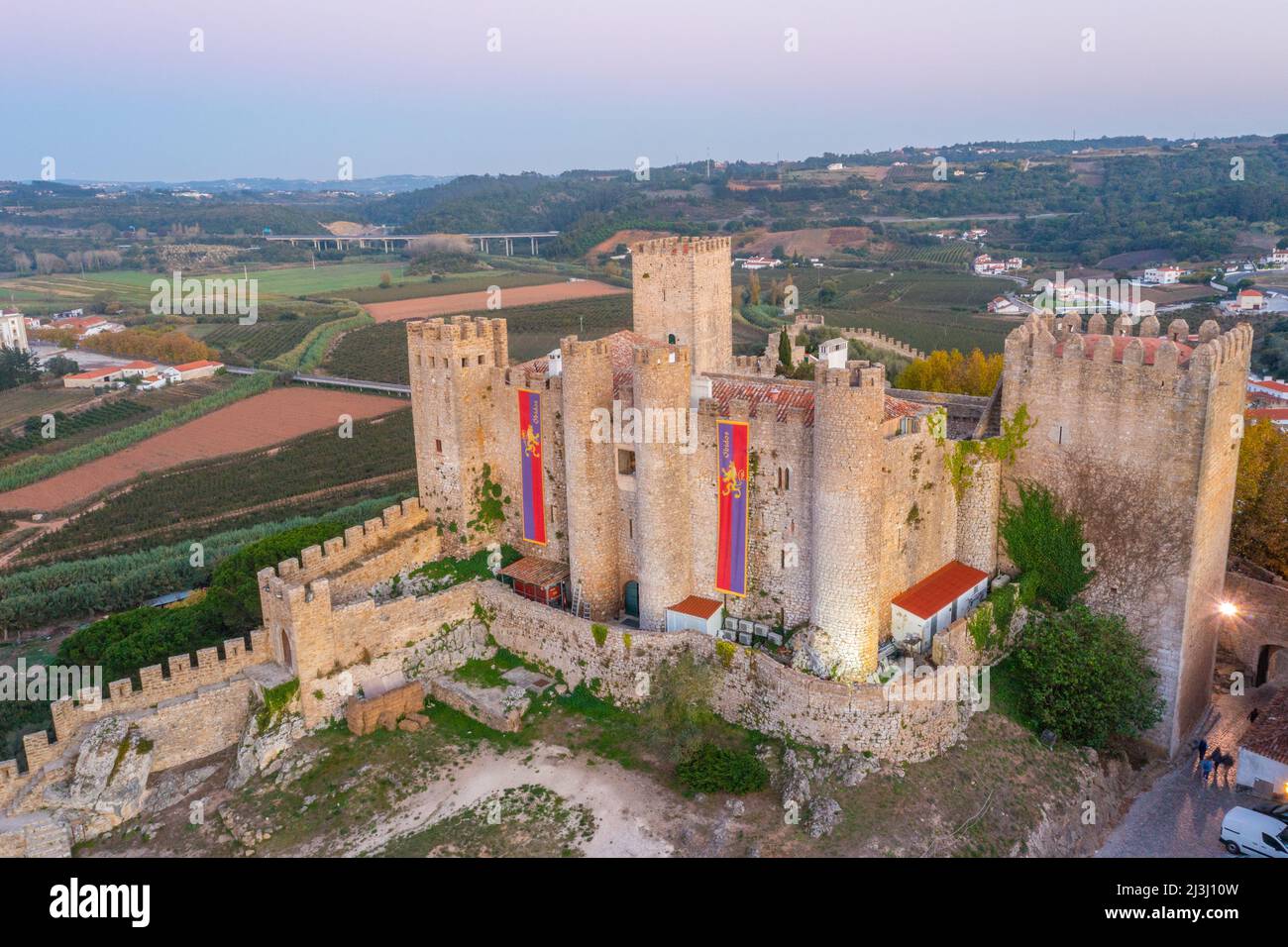 Sunset view of Obidos castle in Portugal Stock Photo - Alamy