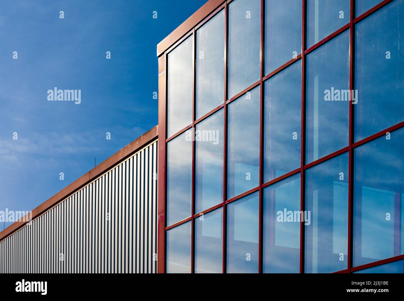 Red windows, corrugated metal building, window, reflection Stock Photo ...