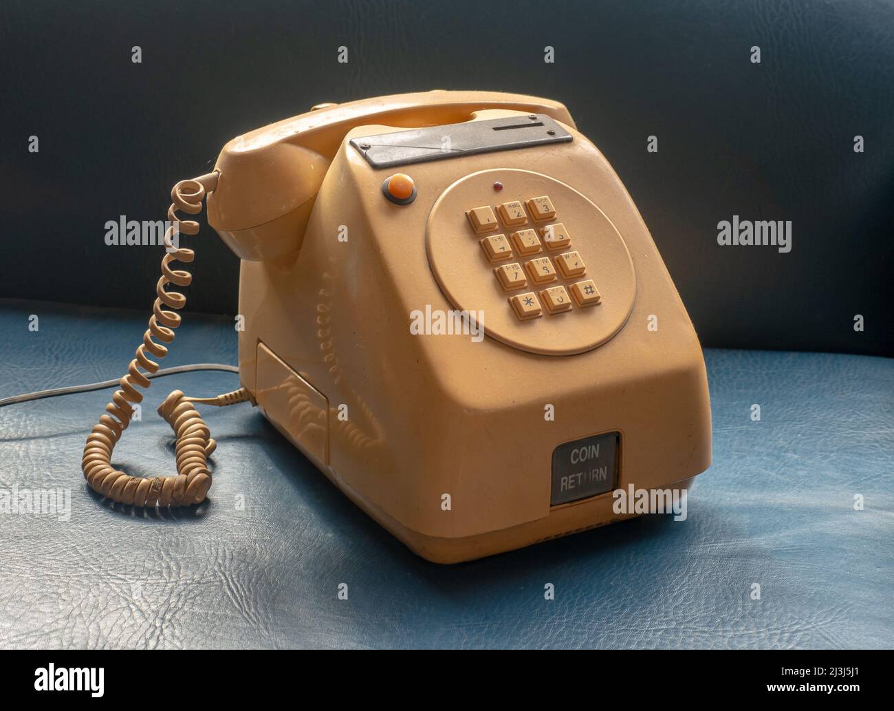 Old table version coin-operated public telephone, the kind used in bars ...