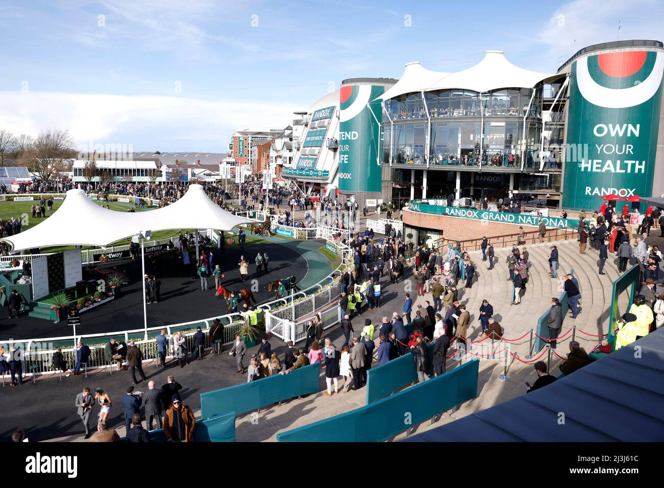 General view of the parade ring and racegoers during Ladies Day at ...